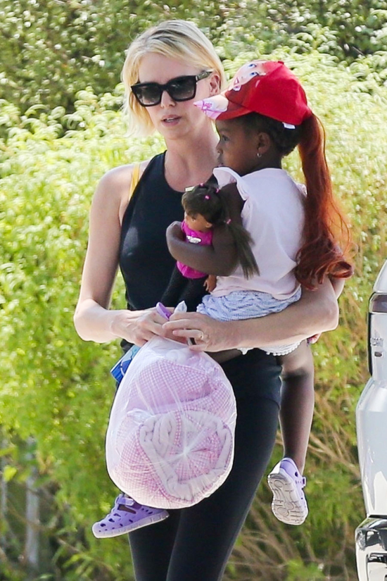 Charlize Theron goes grocery shopping with her daughter August Theron ...