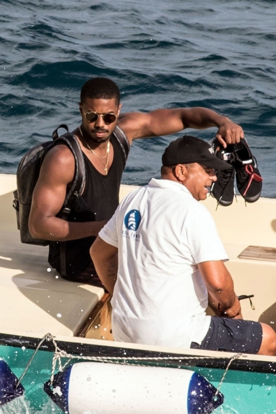 Black Panther and Creed star Michael B Jordan is pictured flexing his ...