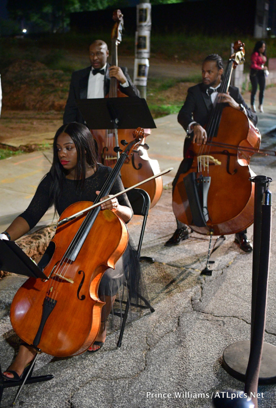 Domani Harris (L) and his girlfriend attend T.I.’s ‘Dime Trap’ Album ...