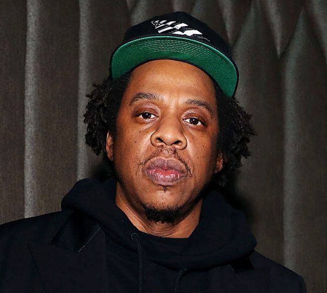 Video of Jay-Z blinking rapidly when asked if he would kneel or stand ...