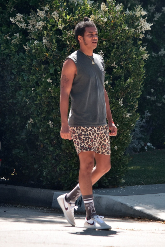 Tia Mowry and Cory Hardrict working out in their garage during ...