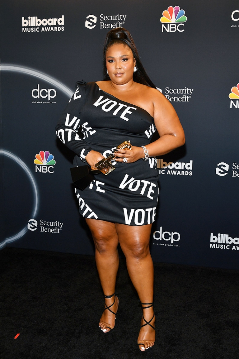 Lizzo poses backstage at the 2020 Billboard Music Awards, broadcast on ...