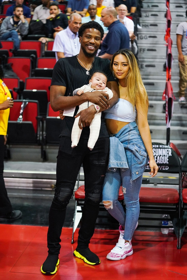 Malik Beasley (L) and girlfriend Montana Yao (R) pose with their son ...