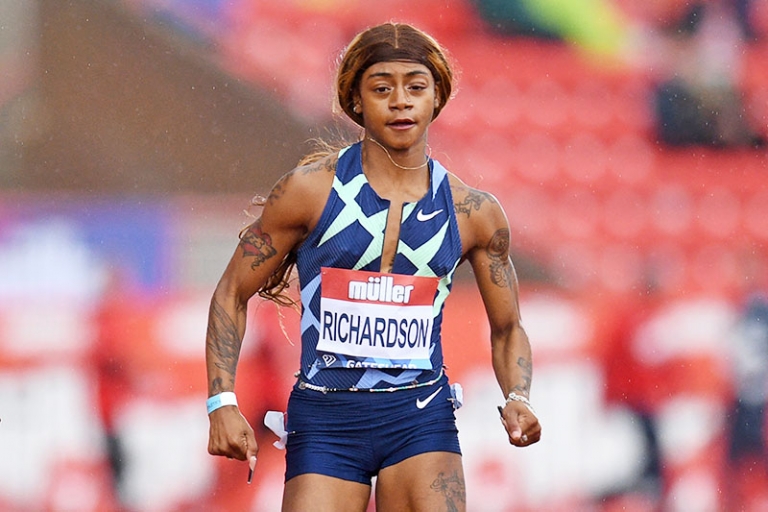 US sprinter Sha’Carri Richardson runs to the line during the first heat ...