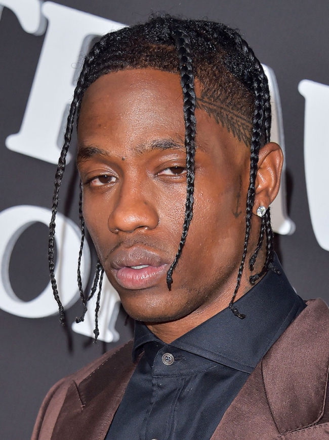 Rapper Travis Scott arrives at the Los Angeles Premiere Of Netflix’s ...