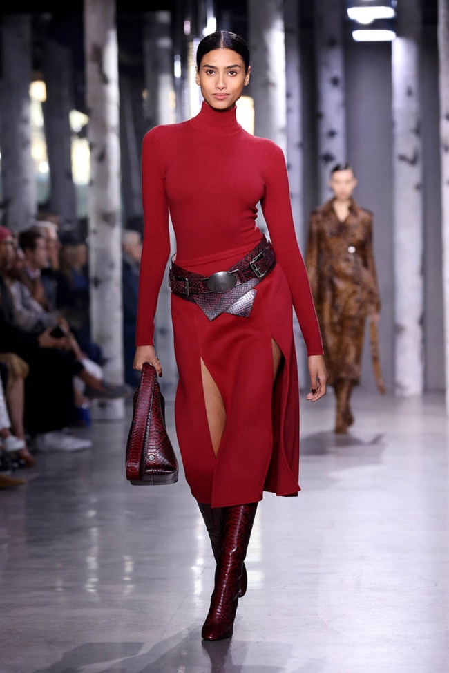 NEW YORK, NEW YORK – FEBRUARY 15: A model walks the runway during the ...