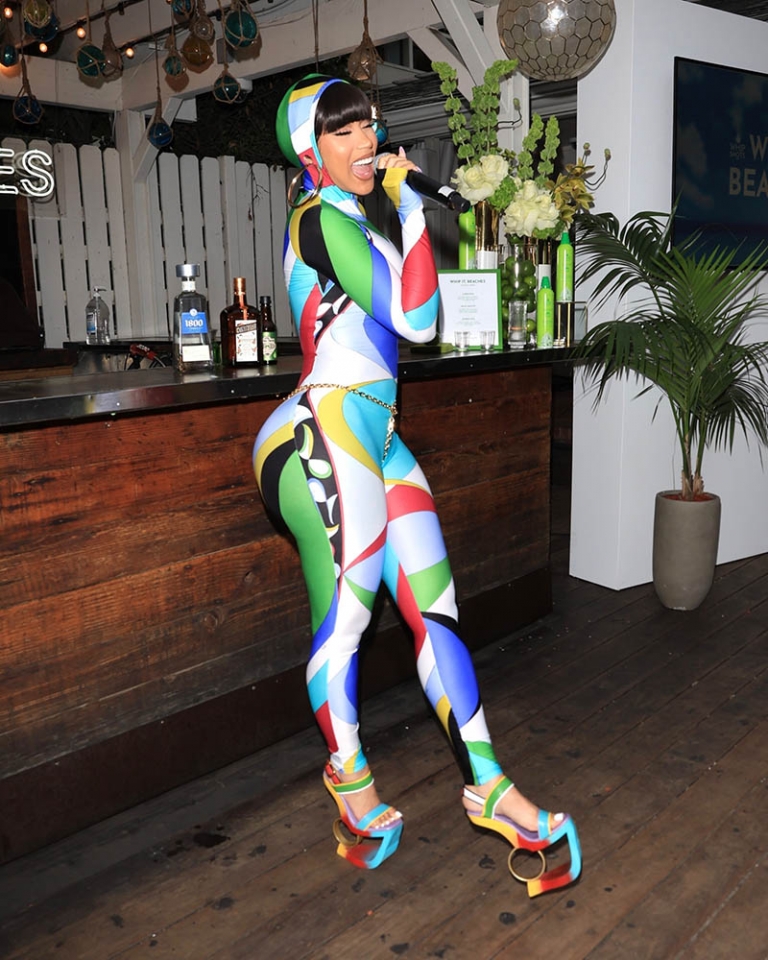 Santa Monica, CA – Cardi B stuns in skin tight colorful ensemble while ...