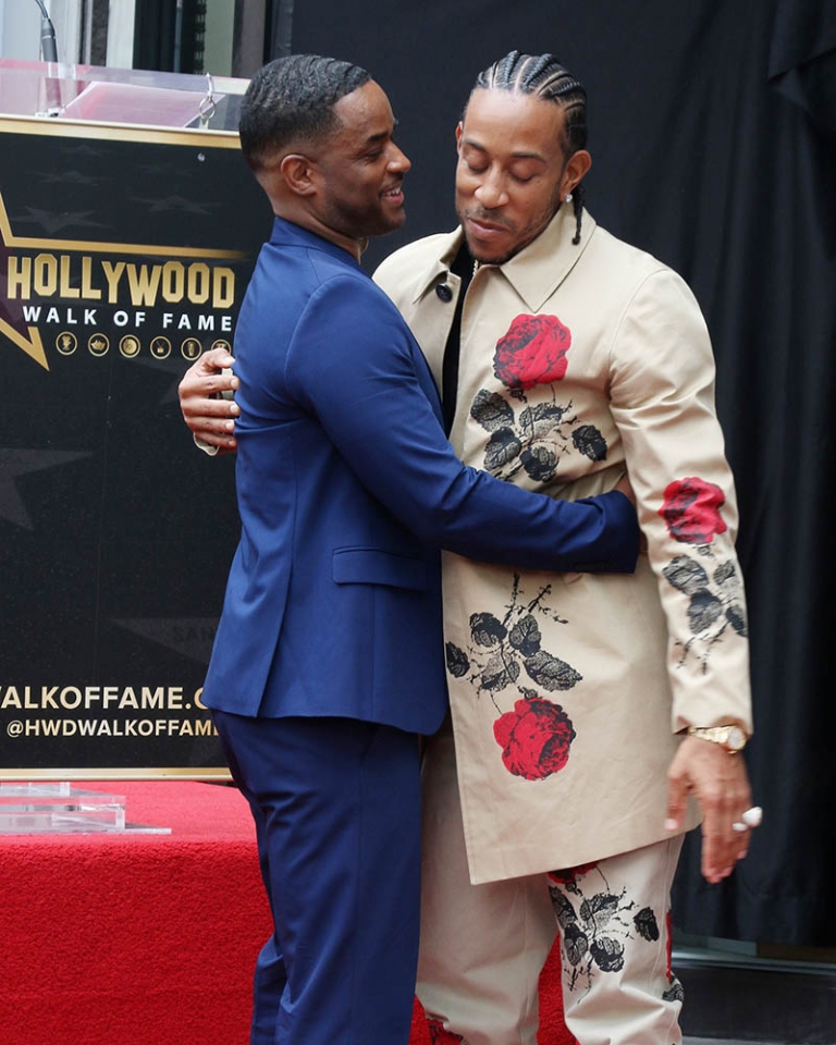 Actor Larenz Tate and Ludacris embrace at Luda’s Hollywood Walk of Fame ...