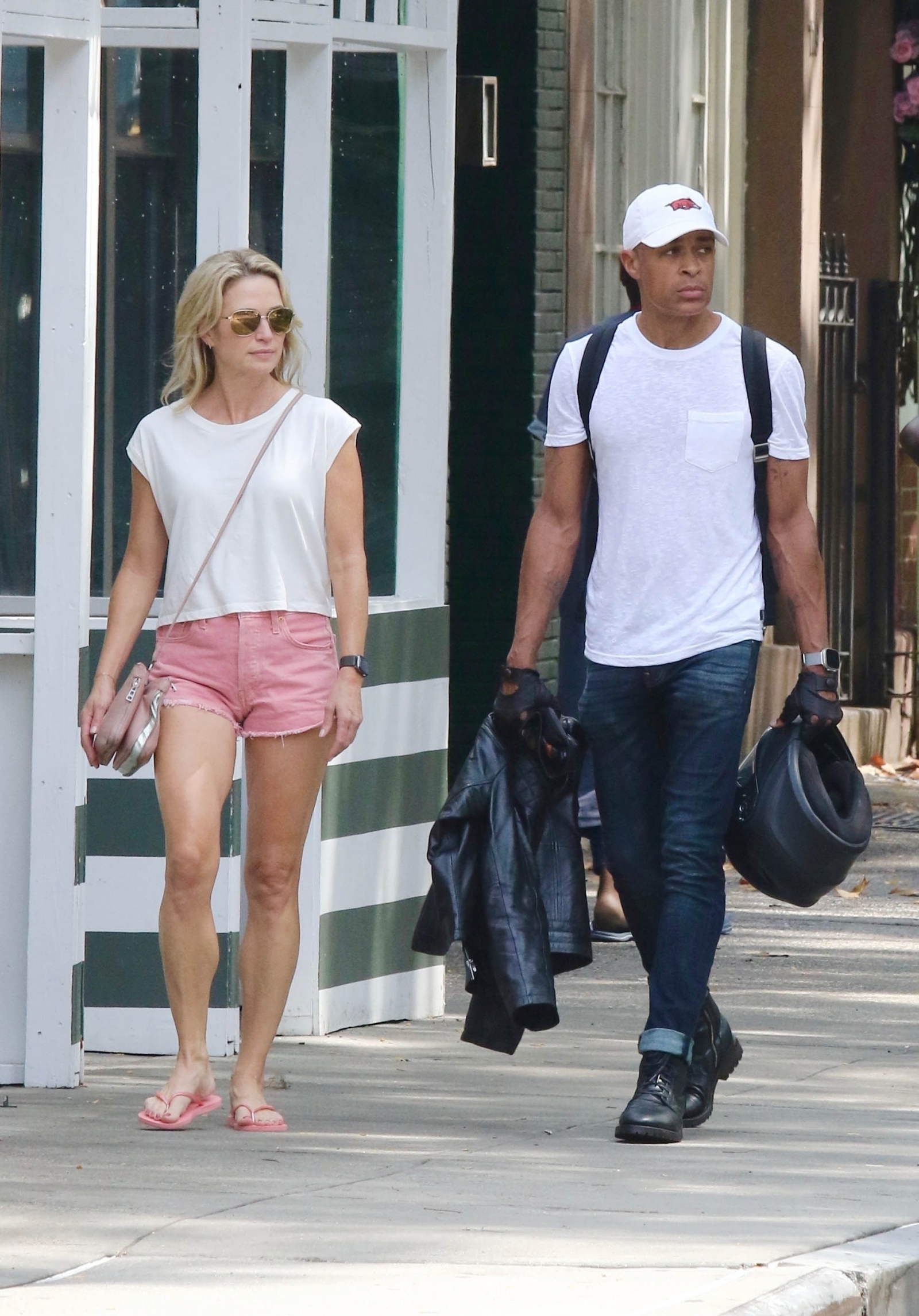 New York City, NY - Amy Robach and T.J. Holmes, with motorcycle helmet ...