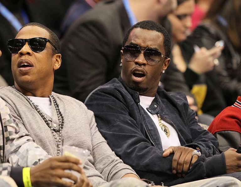 DALLAS – FEBRUARY 13: Producer/rapper Jay-Z (L) and rapper Sean Combs ...