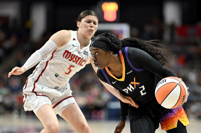 Phoenix Mercury star Khaleah Copper runs off the court after losing her ...