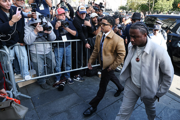 Justin Combs (center L) arrives at Manhattan Federal Court for the sentencing of Sean “Diddy ...