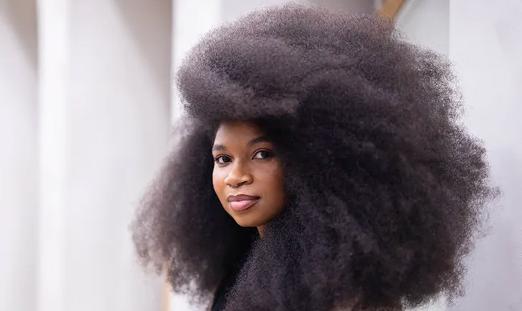 Woman Who Broke the World Record for Largest Afro Speaks on the Need to ...